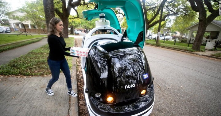 Domino launching pizza delivery robot car